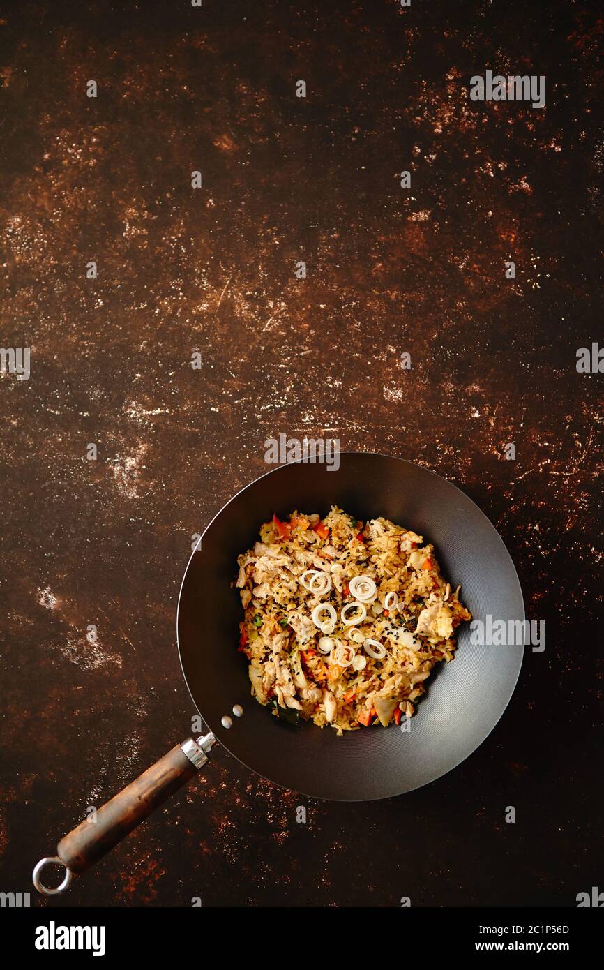 Traditional orginal fried spicy rice with chicken served in a round ...