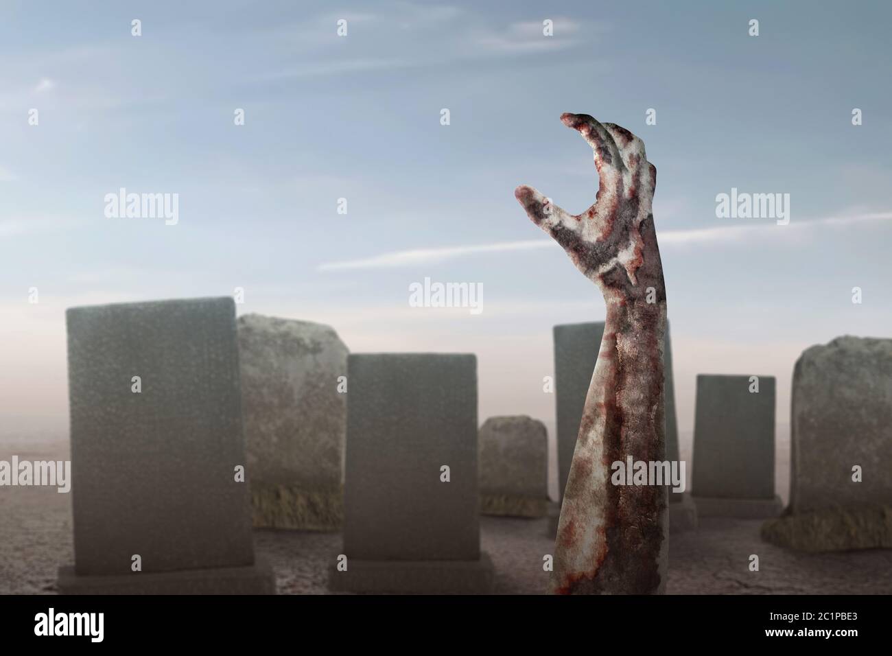 Zombie hand with blood and wound on the graveyard Stock Photo - Alamy