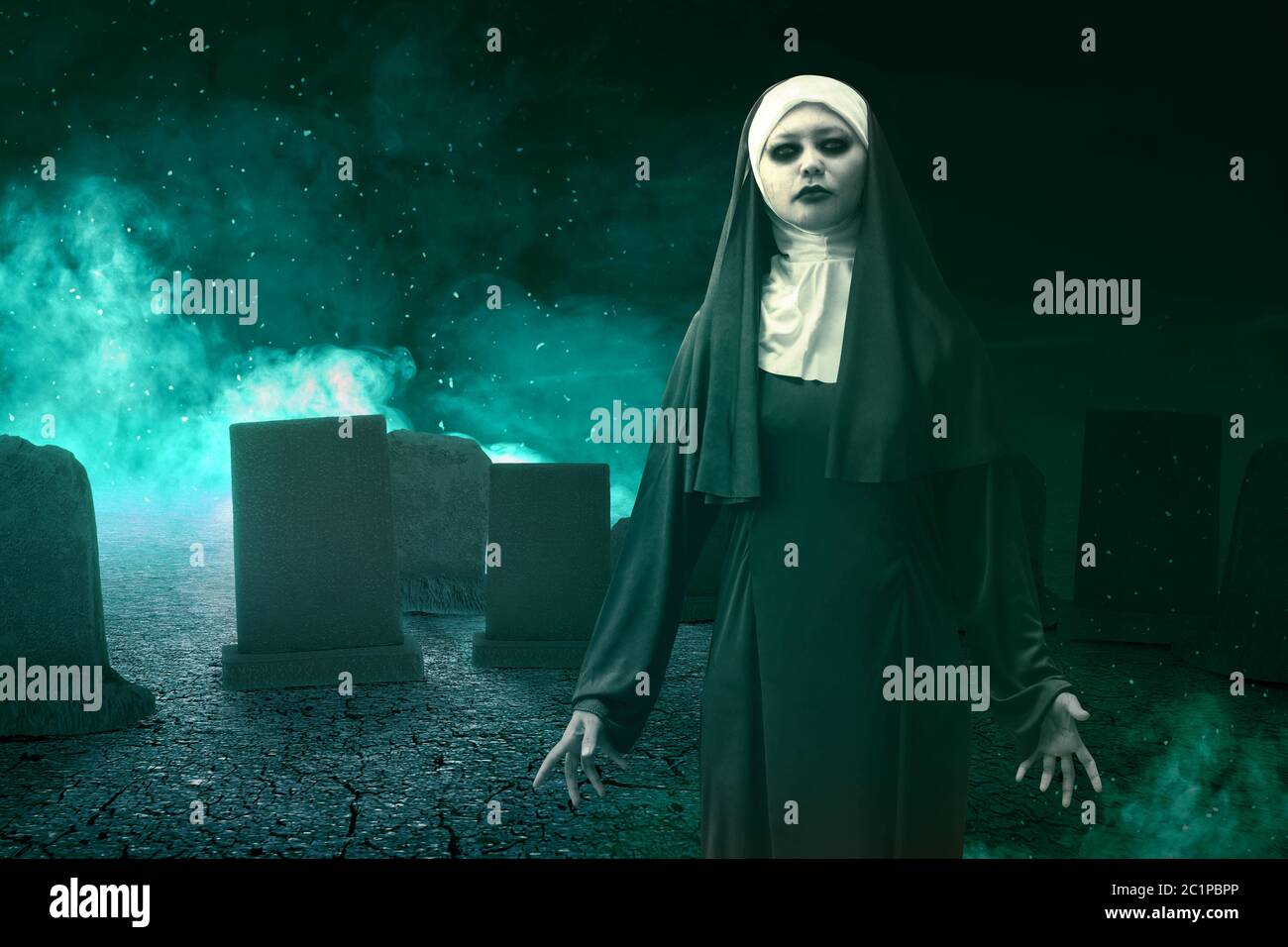 Frightening devil nun standing with mystical fire on the graveyard ...