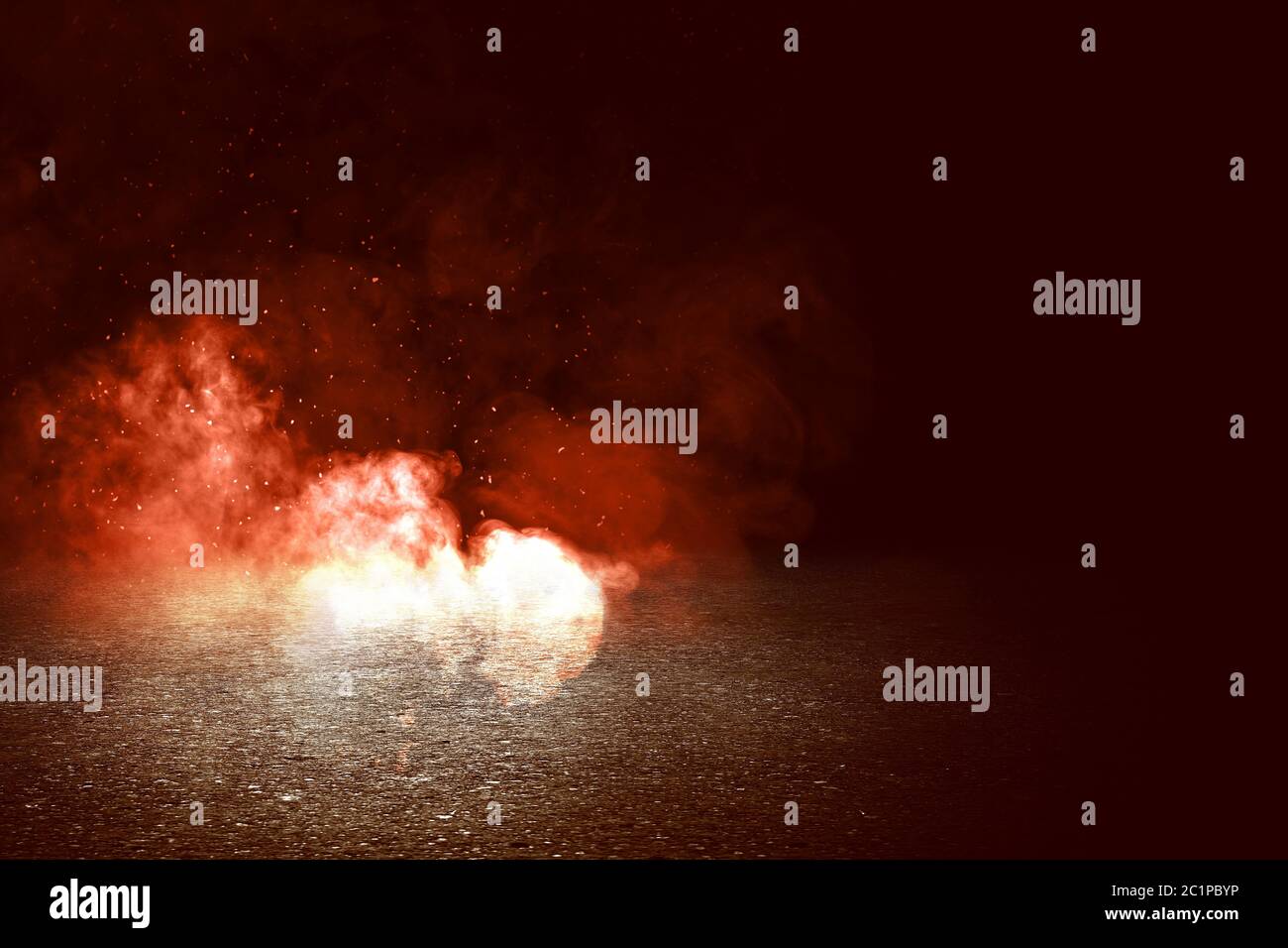 Explosion with sparks and hot smoke on black background Stock Photo - Alamy