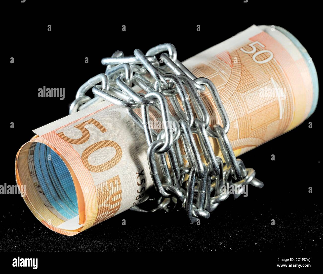 Money in chains Stock Photo - Alamy