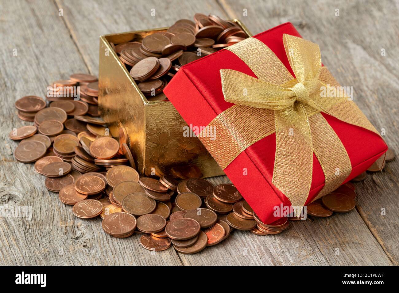 Open gift box coins hi-res stock photography and images - Alamy