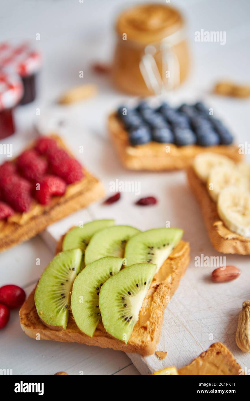 Assortment of healthy fresh breakfast toasts Stock Photo - Alamy