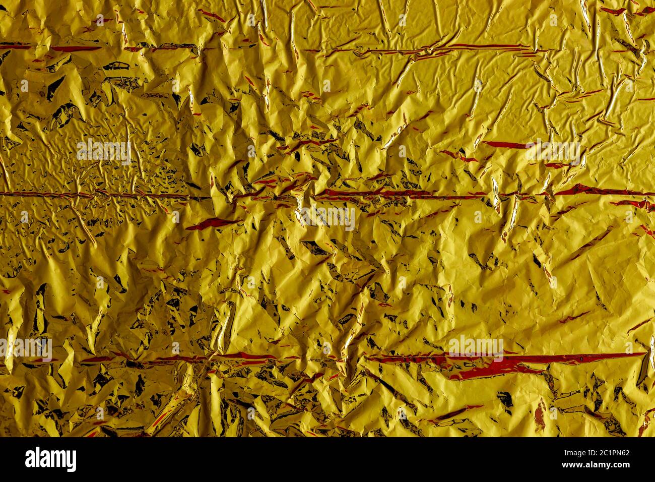 Gold foil as background Stock Photo - Alamy