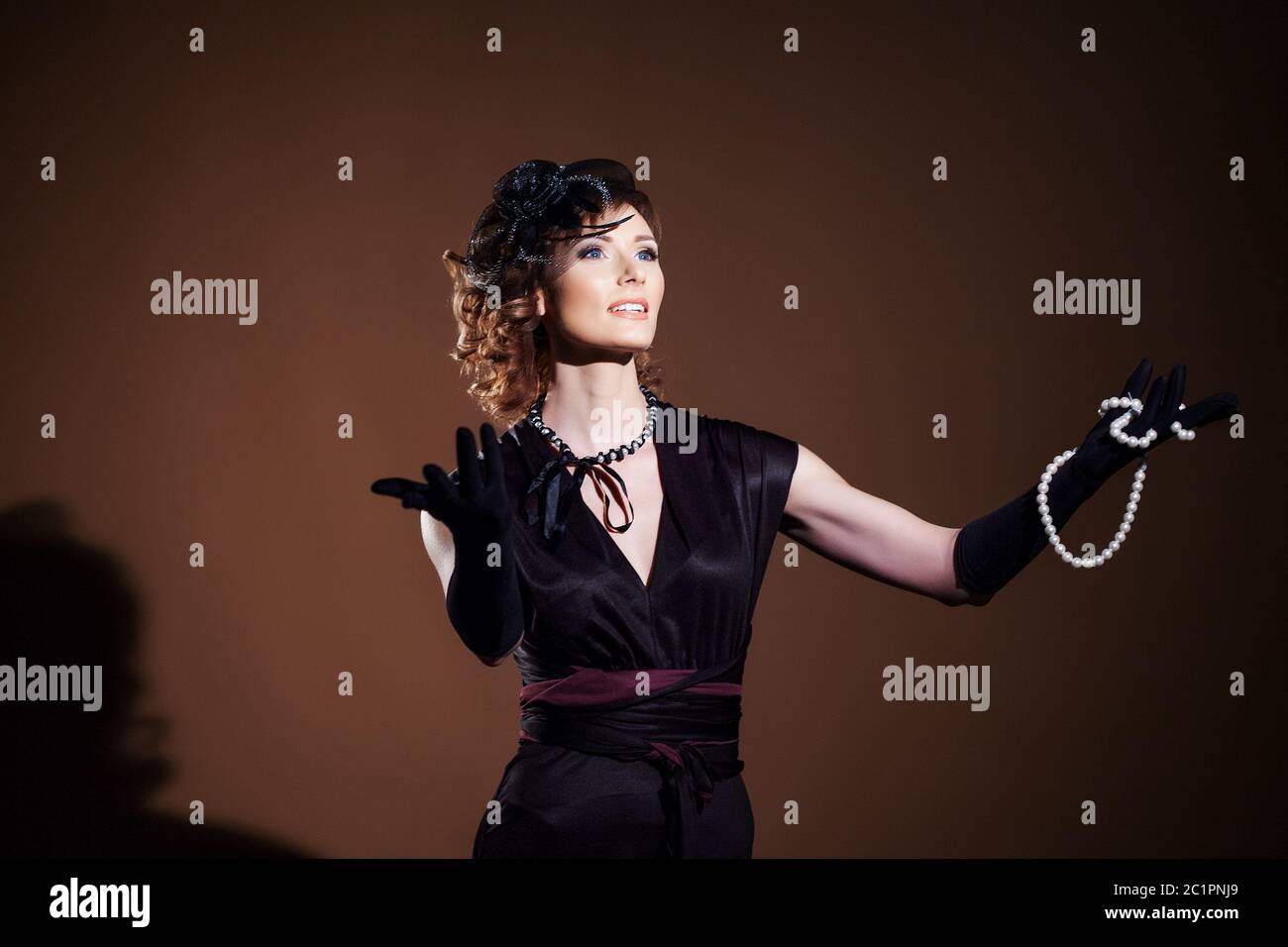 Portrait of inspired beautiful performer Stock Photo - Alamy