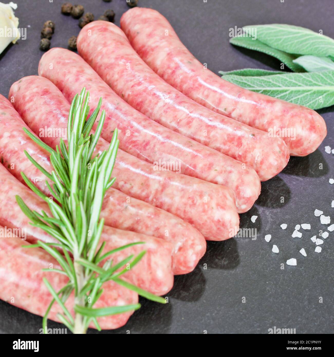 Raw sausages hi-res stock photography and images - Alamy