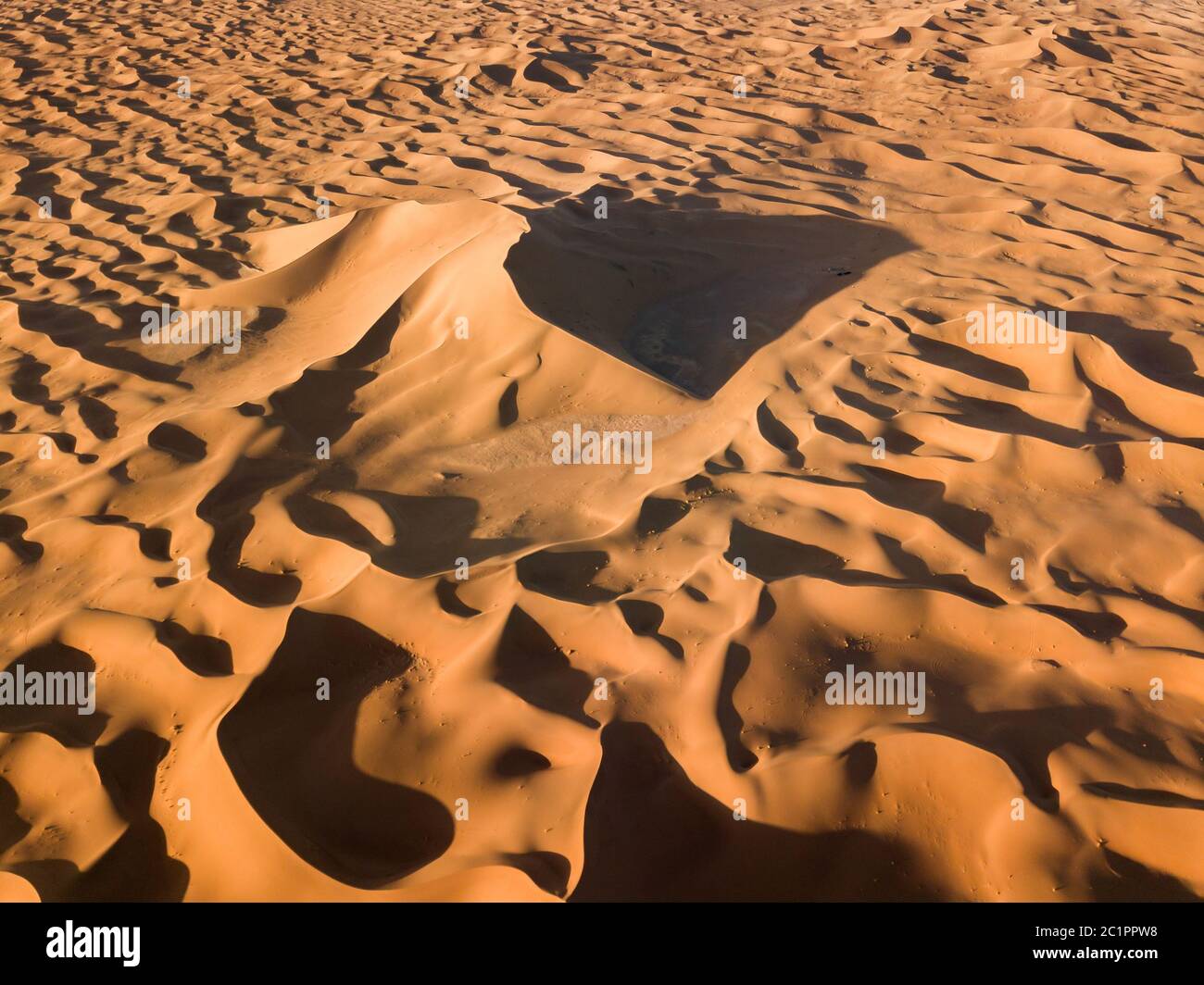 Aerial view on big sand dunes in desert Stock Photo - Alamy