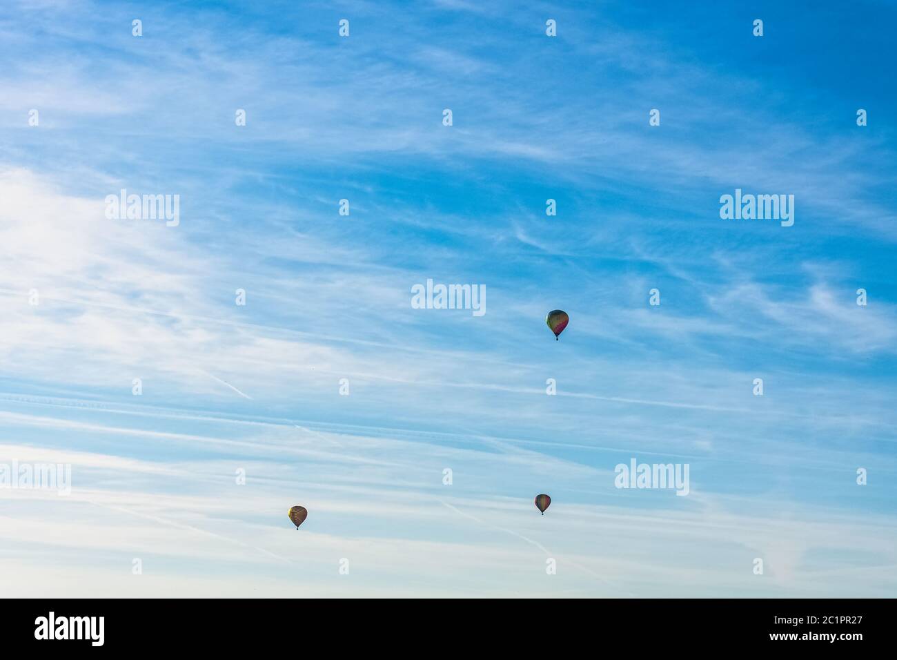 Three hot air balloons over French fields - Dinan, France Stock Photo ...