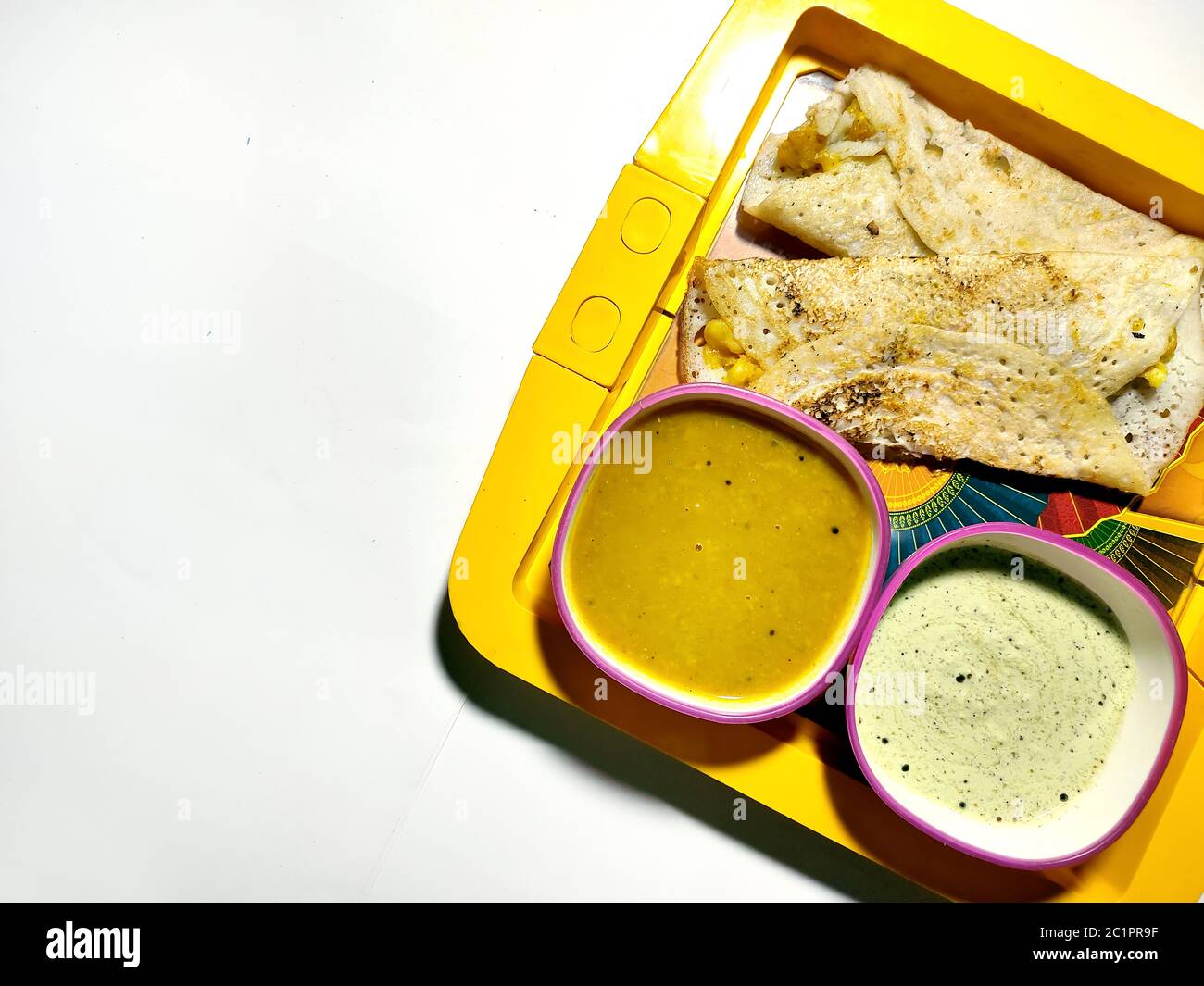 Masala dosa with sambhar and chutney, very famous south indian dish ...