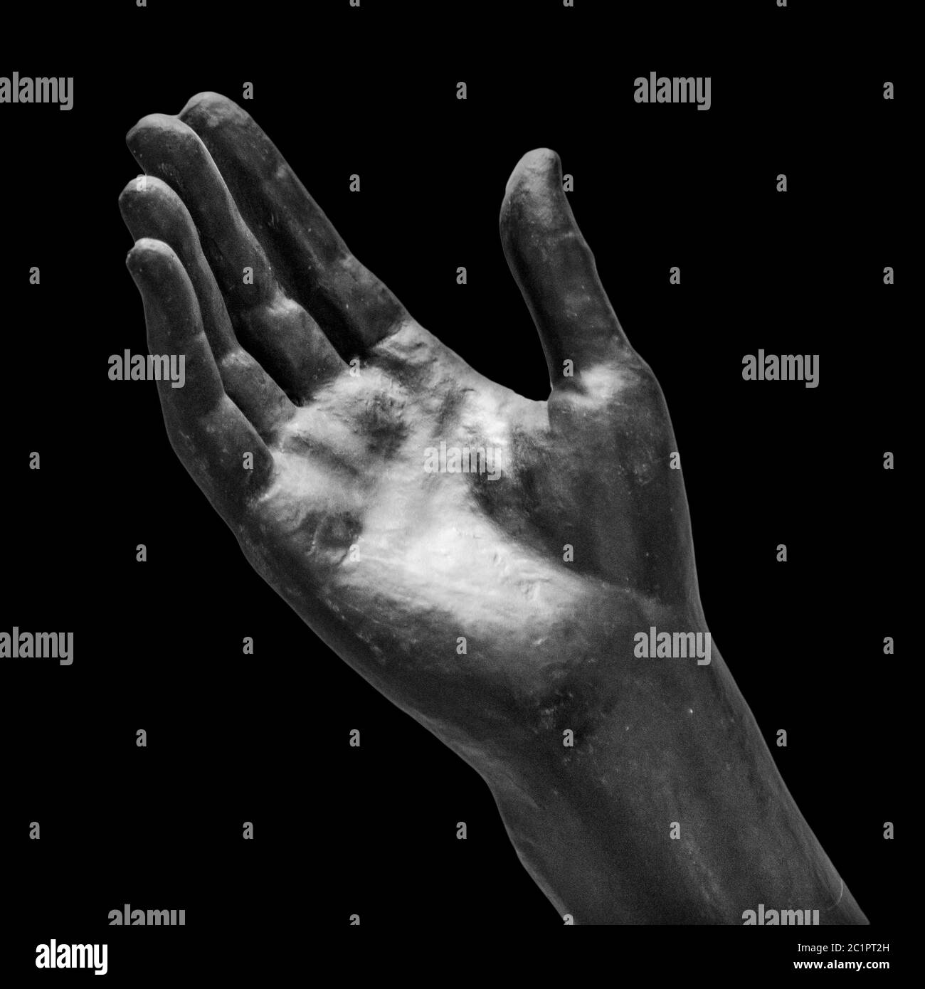 Black stone statue hand on white background Stock Photo - Alamy