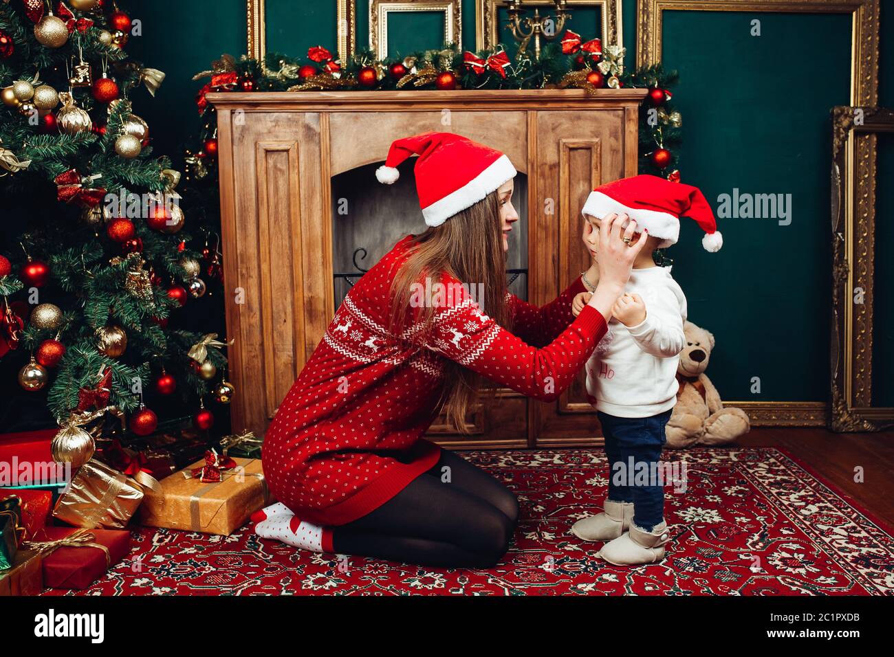 Young smiling woman wearing santa hi-res stock photography and images ...