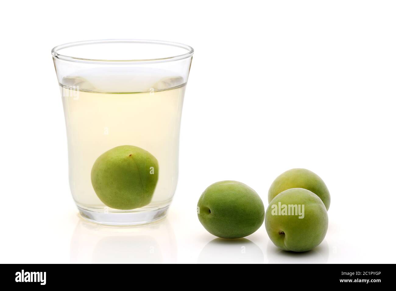 Japanese plum wine called umeshu on white background Stock Photo - Alamy