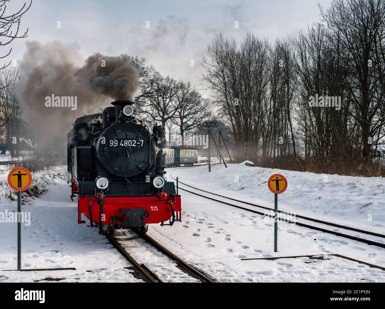 steam locomotive on rain Stock Photo - Alamy