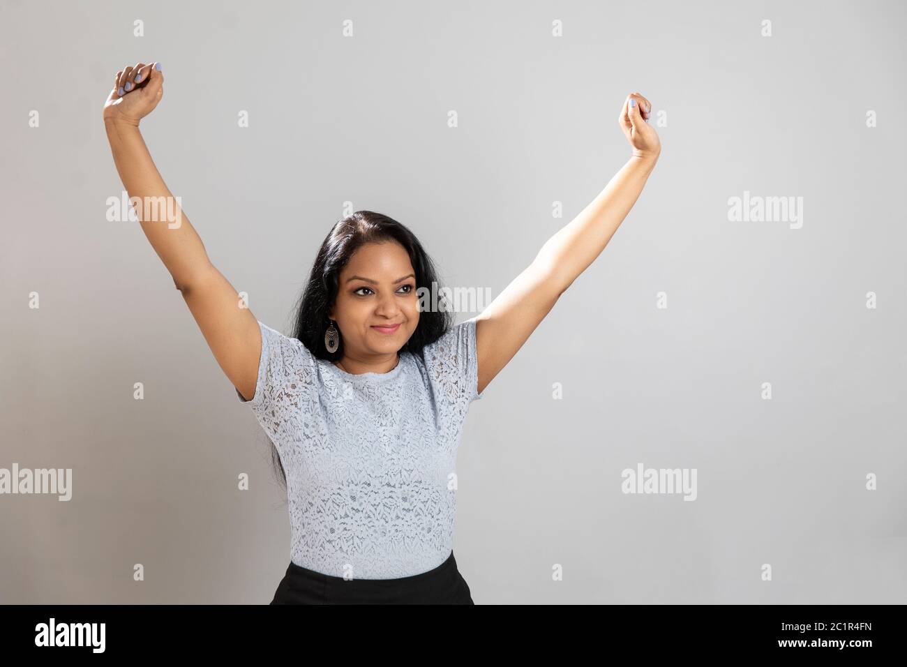 Victory expression by Indian lady Stock Photo - Alamy