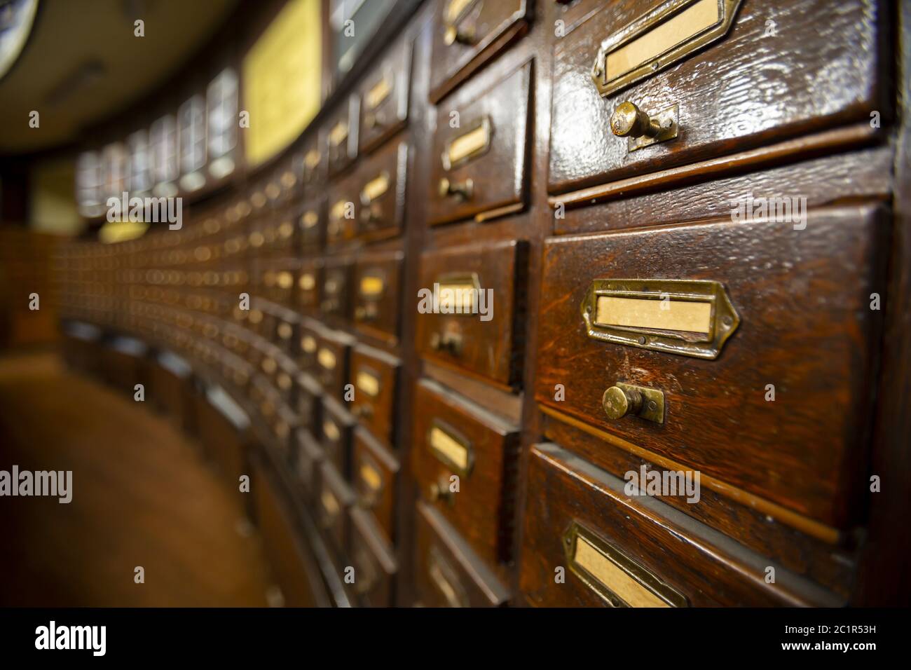 Wooden drawers in an old library Stock Photo - Alamy