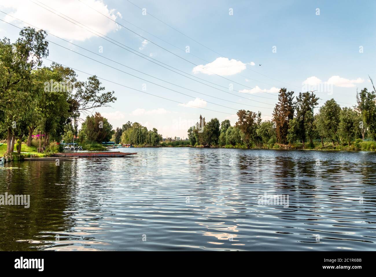 Panoramic view of Xochimilco channels or canals along the floating ...