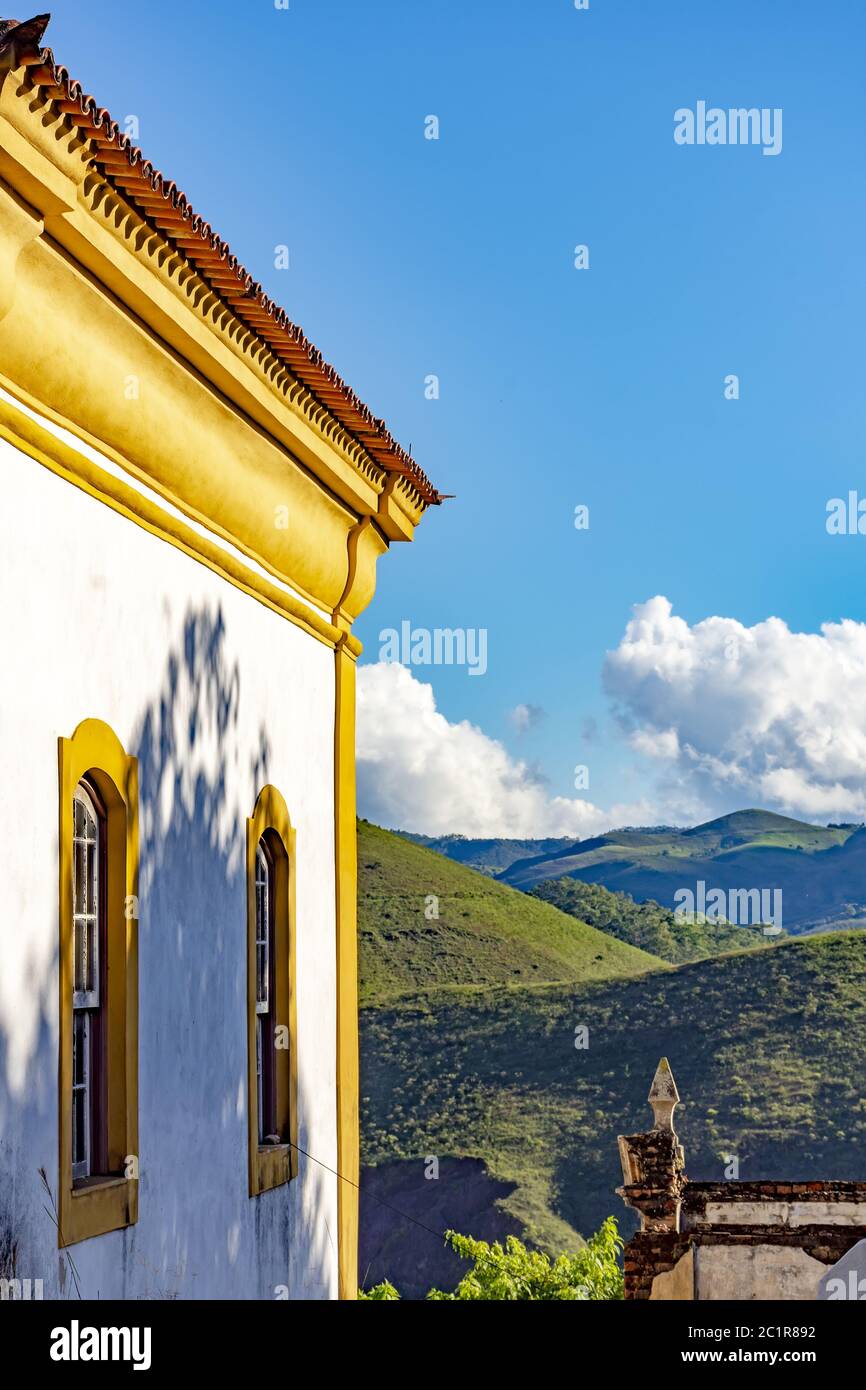 Side view of ancient catholic church with hills and horizon Stock Photo ...
