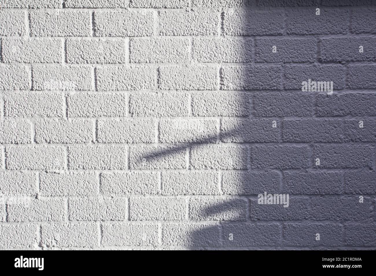 Sunlight on white brickwork hi-res stock photography and images - Alamy