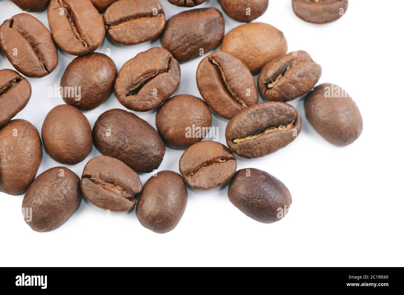 The coffee beans isolated on white Stock Photo - Alamy