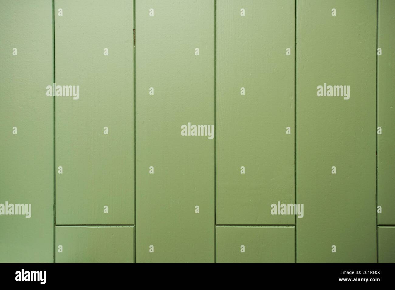 green wooden wall. natural green wood planks background Stock Photo - Alamy