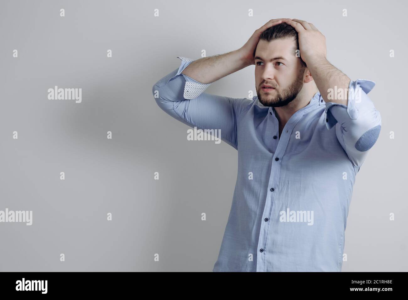 Bearded man holds his head and upset Stock Photo - Alamy Bearded man holds his head and upset Stock Photo - Alamy