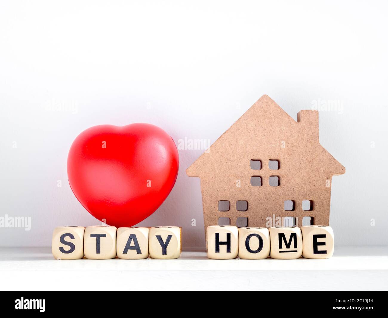 Stay home, stay safe concept. Stay home, words on wooden alphabet with ...