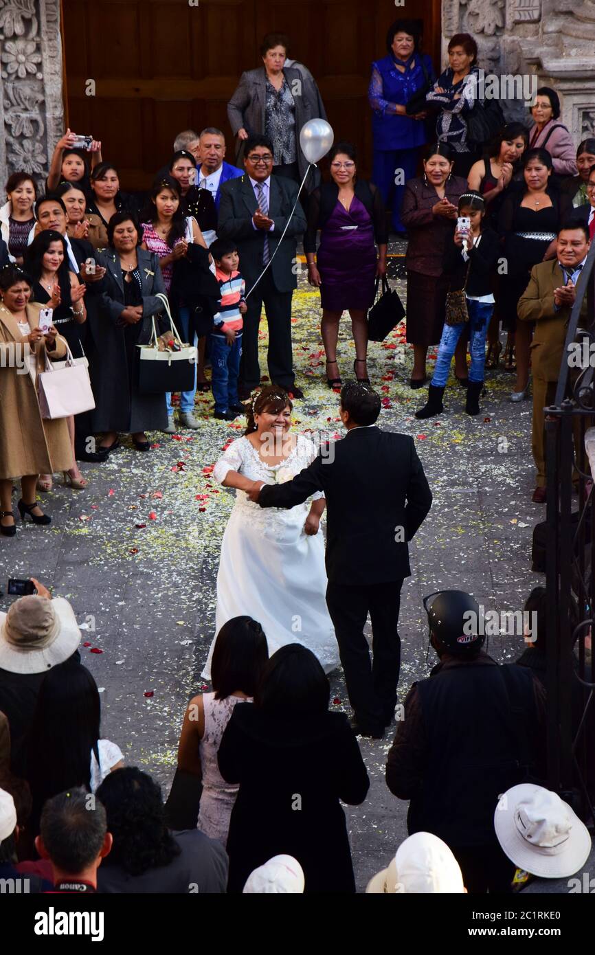 Peruvian wedding with bride and broom dancing outside the church Stock ...