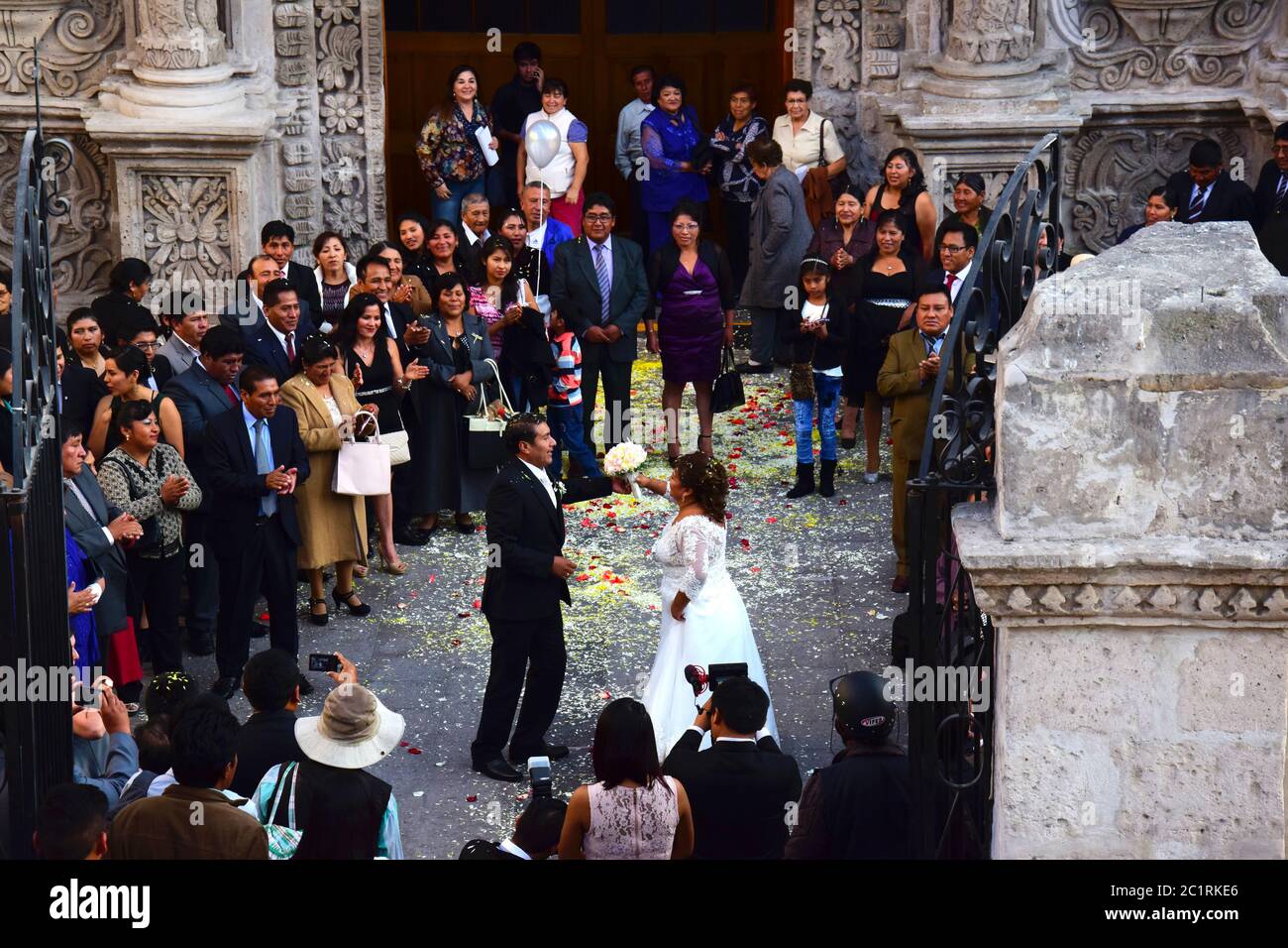 Peruvian wedding with bride and broom dancing outside the church Stock ...