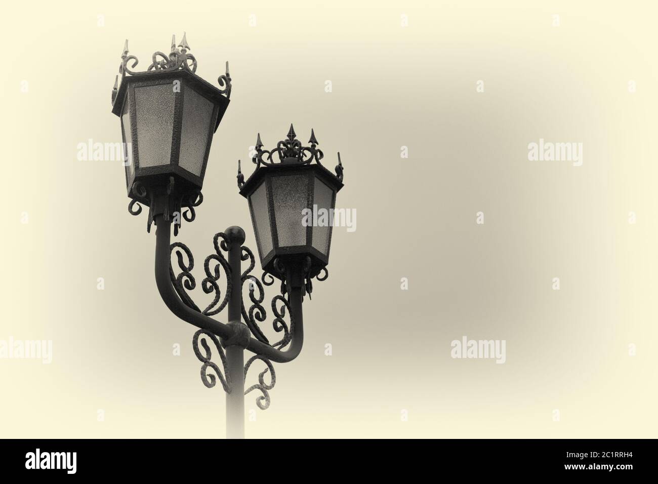 Vintage iron lantern on a city street on a foggy day Stock Photo - Alamy