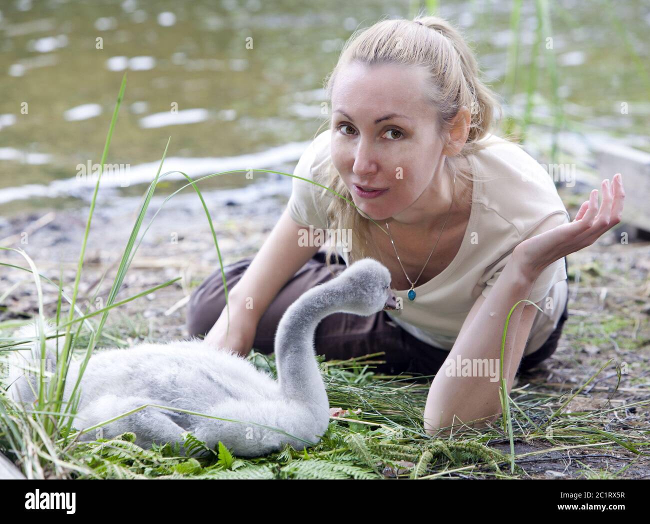 Woman and bird hi-res stock photography and images - Alamy