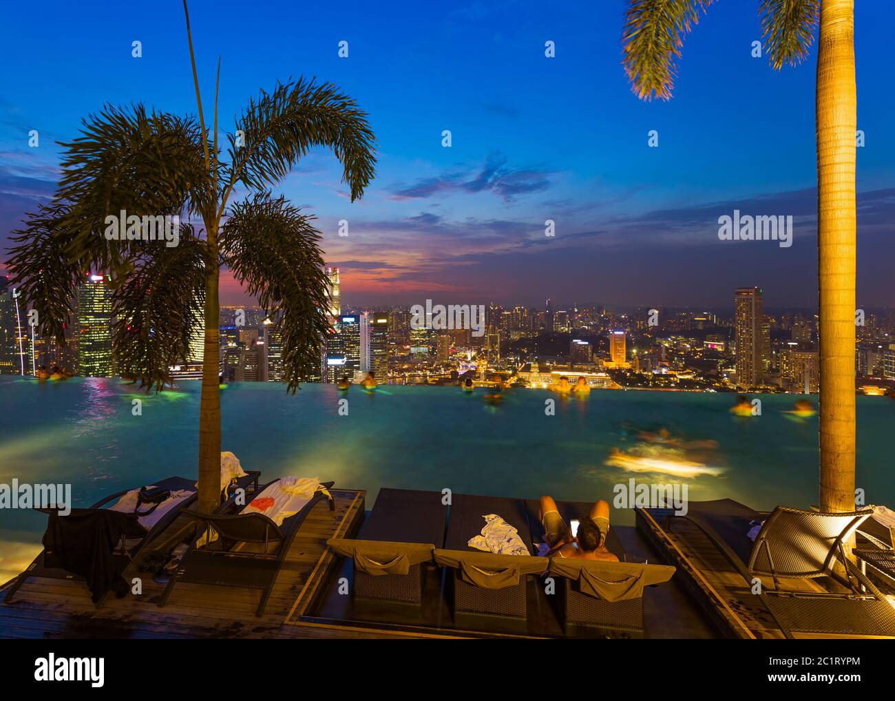 Pool on roof and Singapore city skyline Stock Photo - Alamy