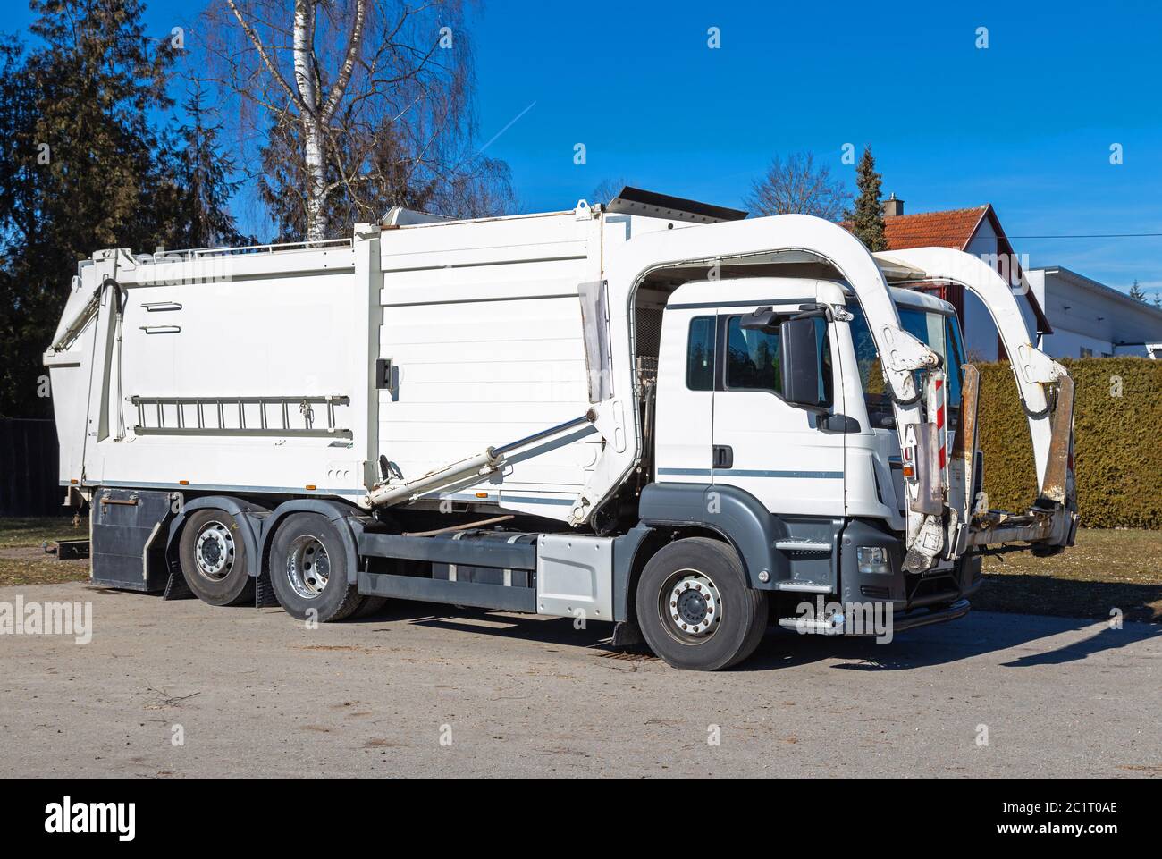 Garbage truck with front loader Stock Photo - Alamy