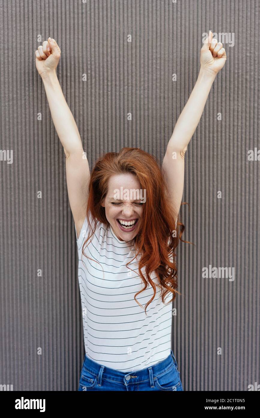 Arms above her head hi-res stock photography and images - Alamy