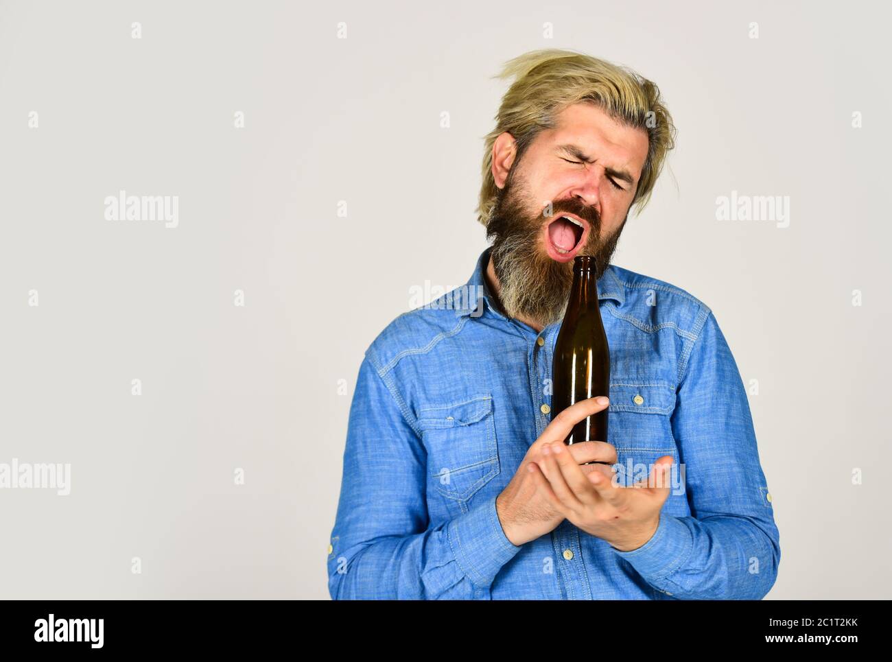 Alcoholism problem. Man with tousled hair looks unhealthy. Hangover ...