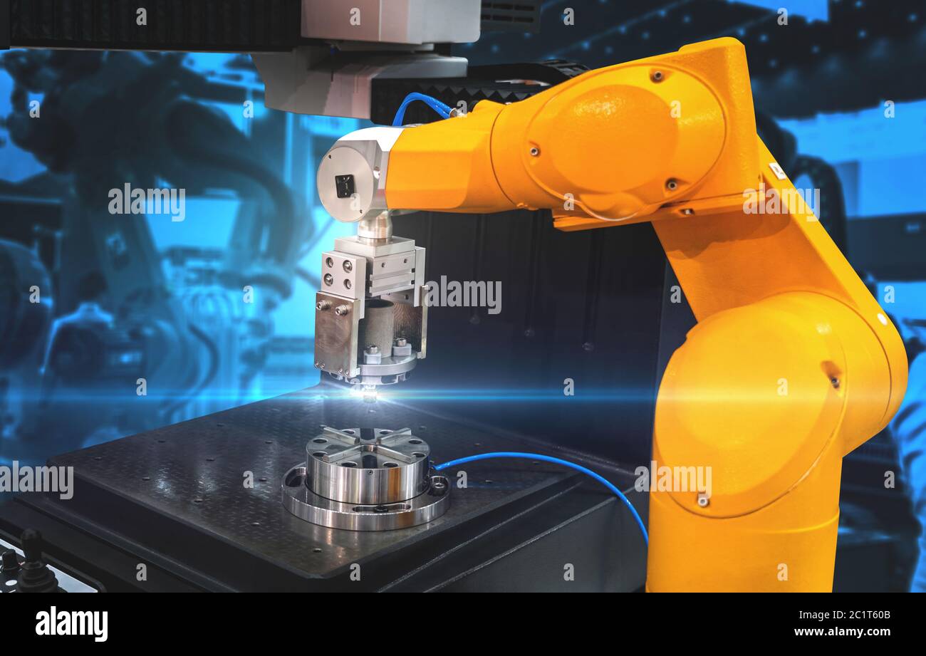 Industry and technology,Robot arm process picking metal part up and ...