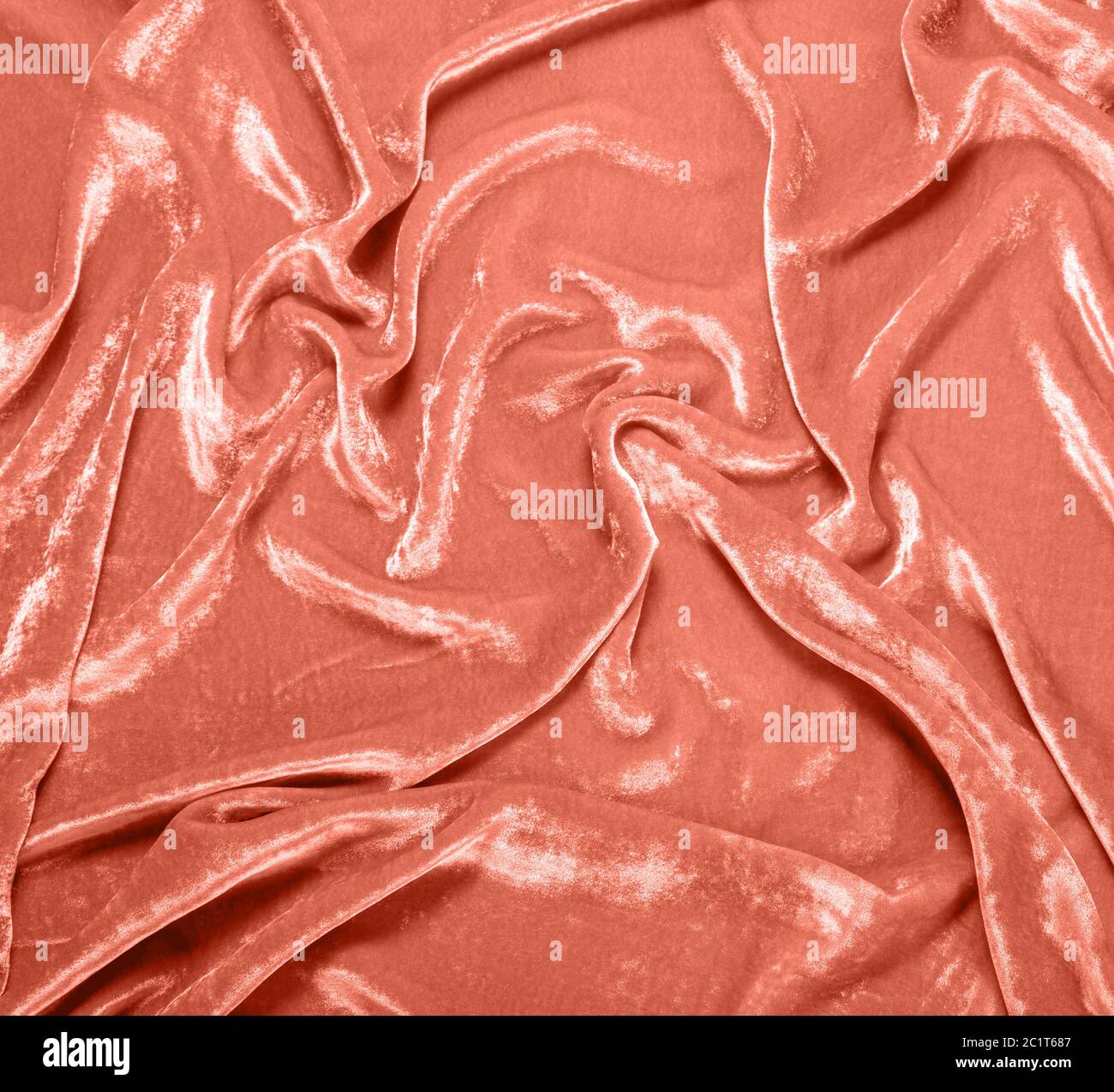 Living Coral color of the Year 2019. Fabric texture background, with ...