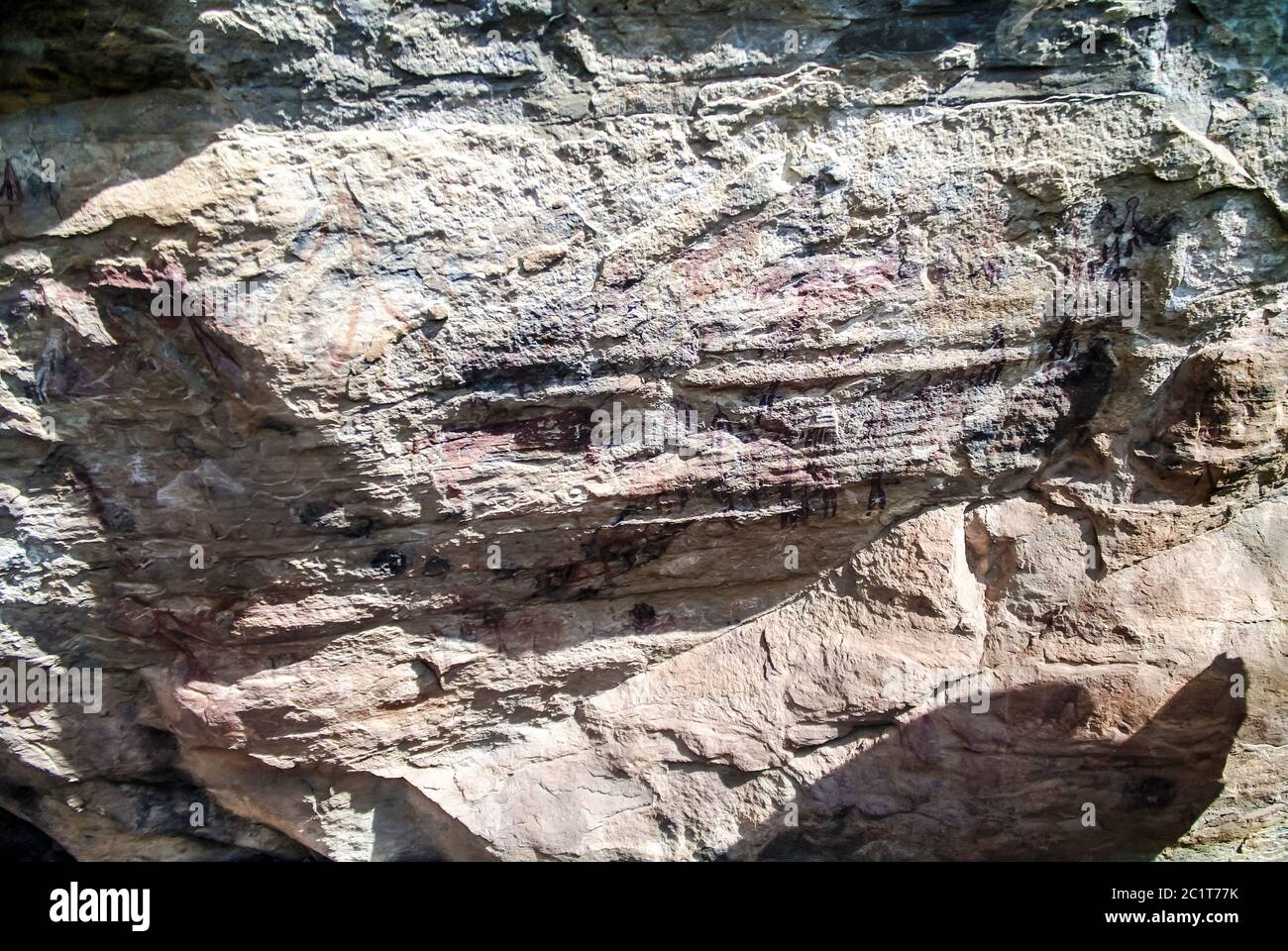 sandstone with bushmen aka San people rock paintings at Makhaleng ...