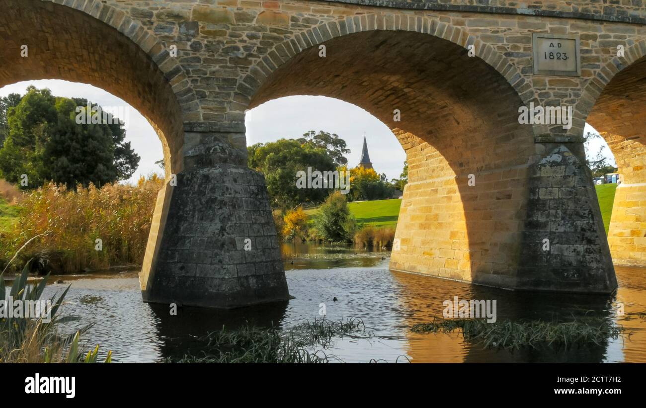 low angle view of the historic old stone bridge and st john's catholic ...