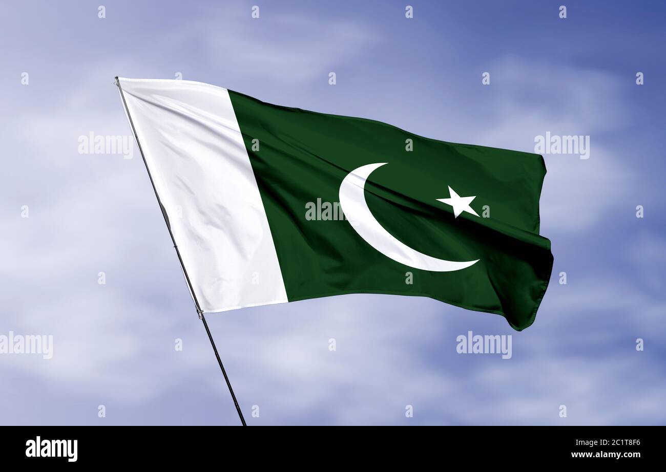 Pakistan flag flying hi-res stock photography and images - Alamy