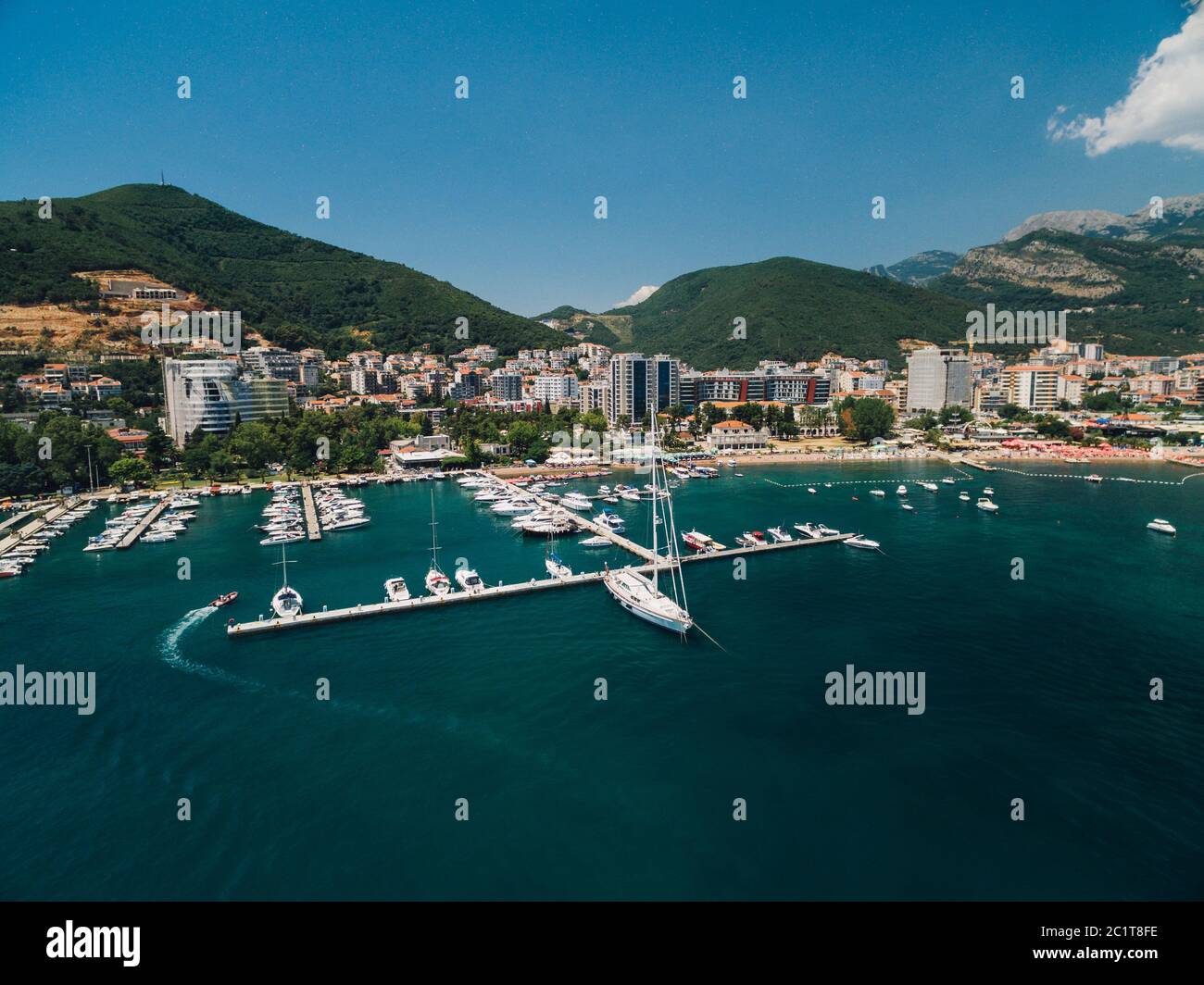 Boat dock and yacht port in Budva, Montenegro. Aerial photo from the ...