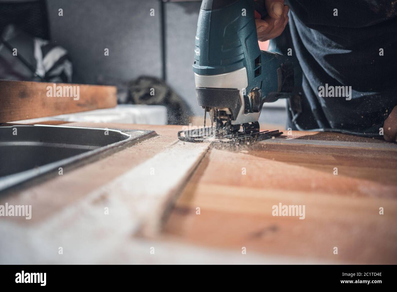 Sawing through wood hi-res stock photography and images - Alamy