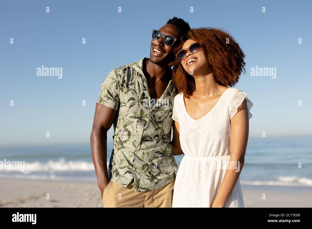 Couple having fun on beach hi-res stock photography and images - Alamy