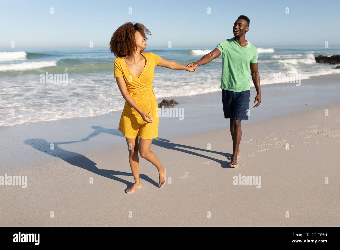 Couple tropical beach mixed race hi-res stock photography and images ...