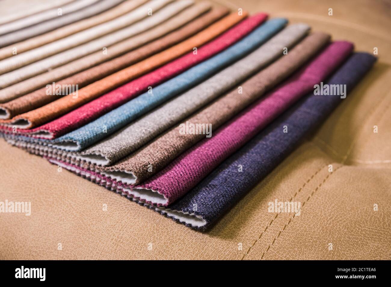 Colorful and bright fabric samples of furniture and clothing upholstery ...