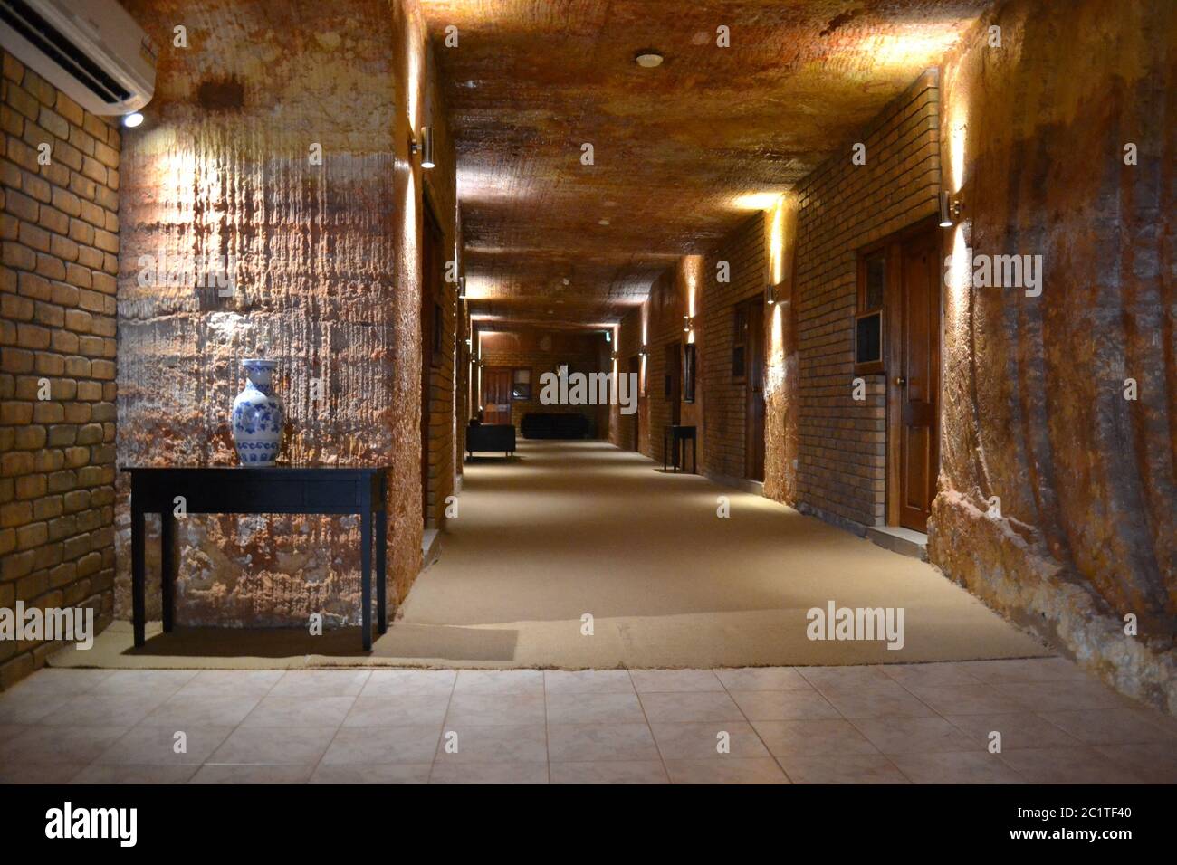 Interior passage or hallway lobby in an underground rock hotel in ...