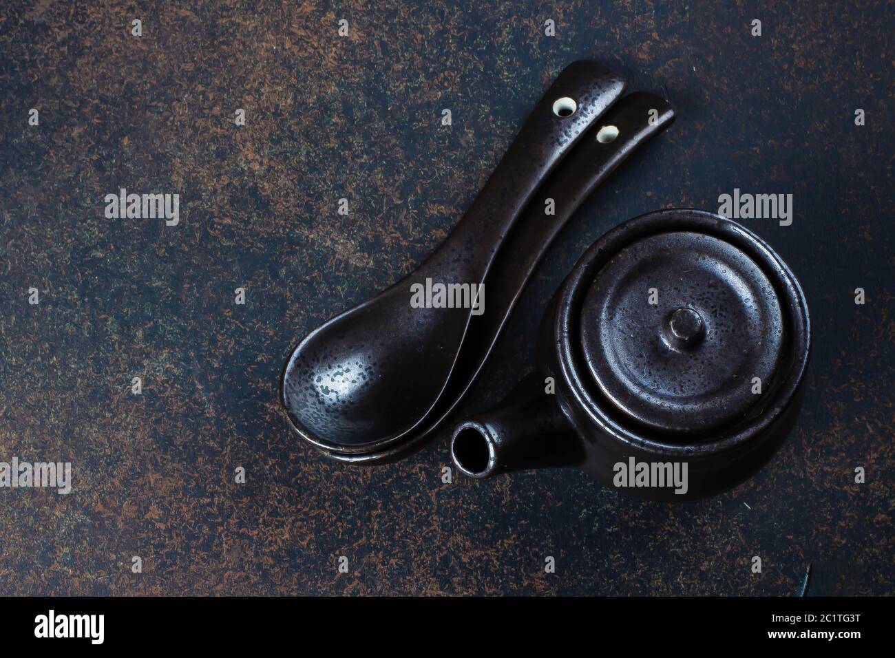Japanese and Chinese food equipment on dark stone concrete table ...