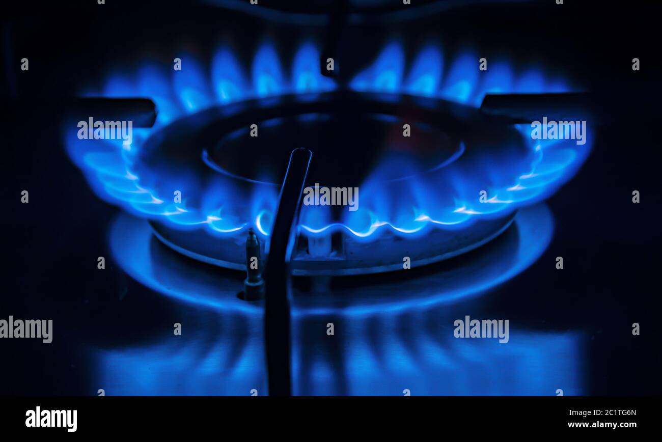 Blue flame of the stove in the kitchen Stock Photo - Alamy