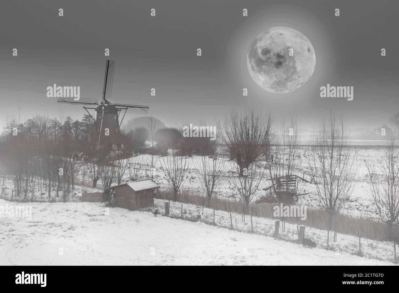 Beautiful Dutch winter windmill landscape with full moon black and ...