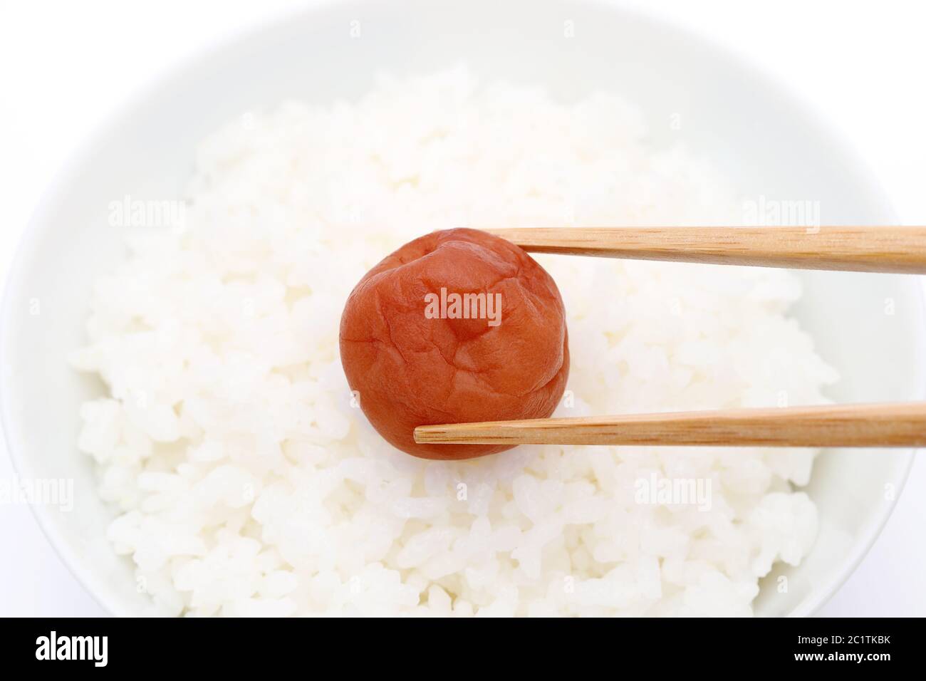 Japanese food, Umeboshi pickled salt plum on white rice, on white ...