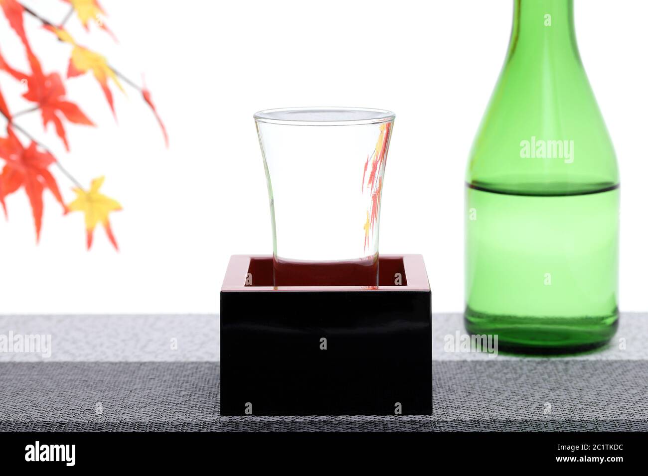 Japanese wooden box masu with sake on wooden tray, on white background ...